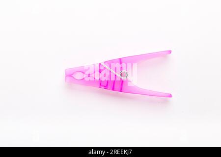 Bright pink plastic clothespin isolated on white Stock Photo - Alamy