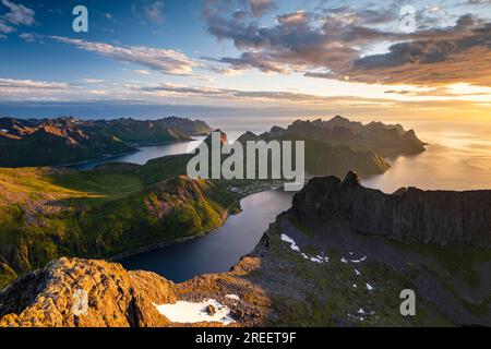 View over Senja's fjords and mountain peaks under the midnight sun ...