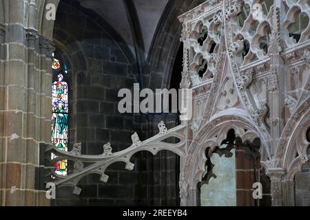 Kersanton granite rood screen, the only stone choir screen in Brittany ...