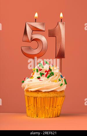 Candle number 51 - Cake birthday in blue background Stock Photo - Alamy