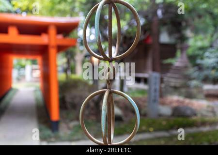 Rings on a traditional Japanese rain chain, or kusaridoi, at Kasuga ...