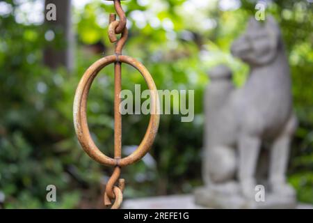 Rings on a traditional Japanese rain chain, or kusaridoi, at Kasuga ...