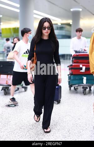 Chinese actress and singer Zhu Zhu appears at airport in Shanghai ...