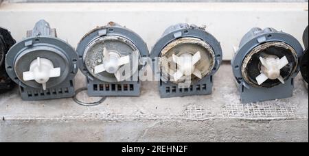 old washing machine water pumps Stock Photo - Alamy