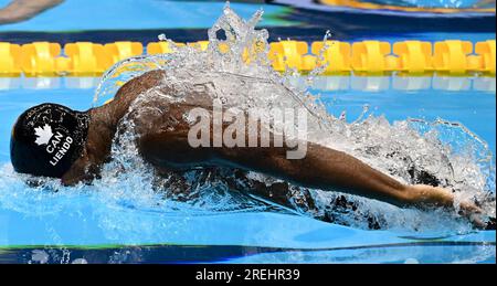 Josh Liendo, of Canada, competes in a men's 100-meter butterfly heat at ...