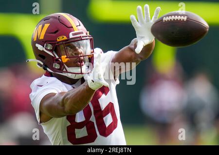 Washington Commanders wide receiver Mitchell Tinsley (86) runs during a ...