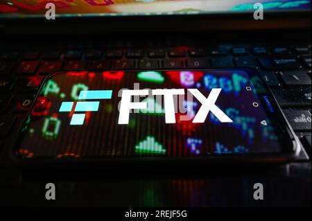 In this photo illustration, a FTX logo is seen displayed on a ...