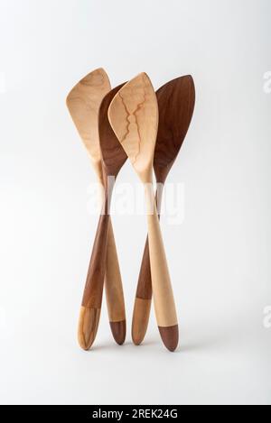 Wooden spatula for stirring, kitchen gadget. Studio Photo Stock Photo ...