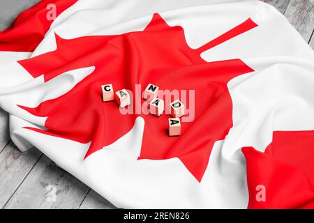 Flag of Canada on grey wooden background Stock Photo - Alamy