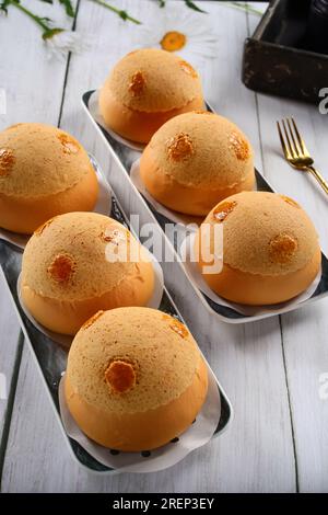 dim sum bread Pineapple bun,Cantonese Polo Bun Stock Photo - Alamy