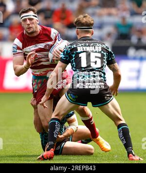Wigan Warriors Jake Wardle, left, and Warrington Wolves Dan Russell ...