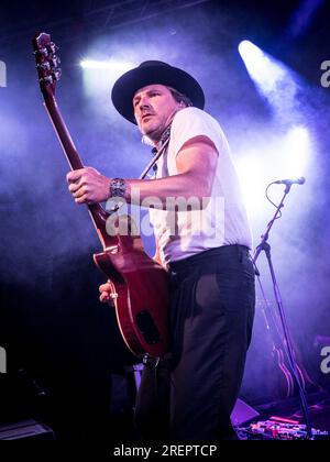 Nalle Colt on guitar Stock Photo - Alamy