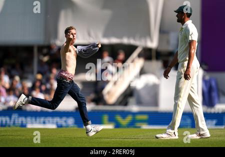 Australia's Mitchell Starc looks on to the new ball during a spell on ...