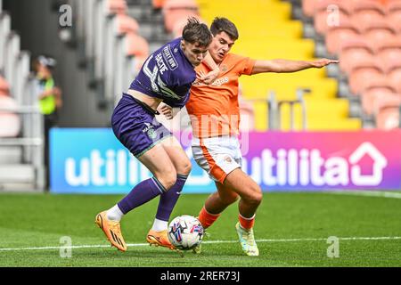 Rob Apter #36 of Blackpool battles with Owen Hastie #45 of Hibernian ...