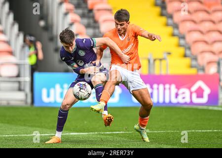 Rob Apter #36 of Blackpool battles with Owen Hastie #45 of Hibernian ...