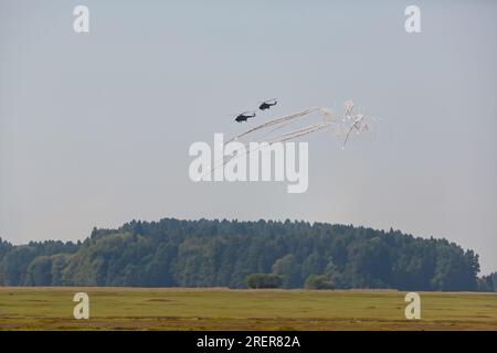 military helicopters evading air defense. A helicopter releases heat ...