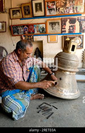 Artisan making a temple bell in Kumbakonam, Tamil Nadu, India, Asia ...