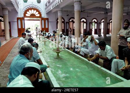 Ritual ablution at pool before namaz The Jamia Masjid in Bengaluru ...