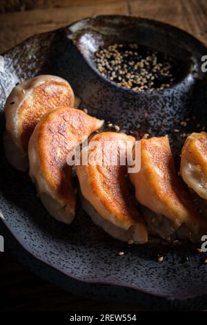 Gyoza are cooked at a Chinese Restaurant in Tokyo on July 1, 2026 ...