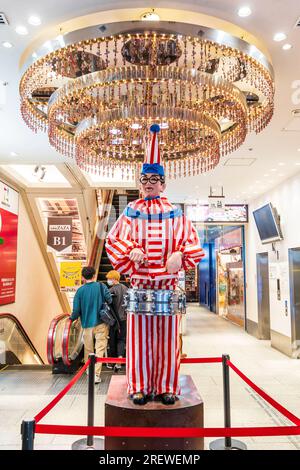 The famous Kuidaore Taro clown store at night in Dotonbori, Osaka ...