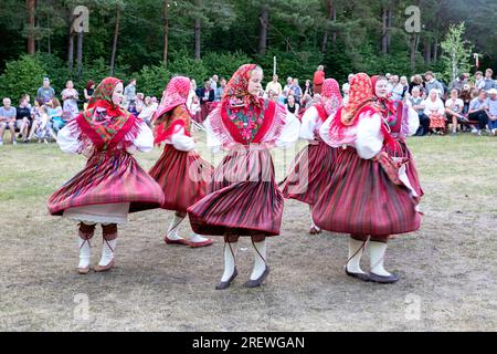 Girls in traditional estonian clothing dancing and celebrating estonian ...