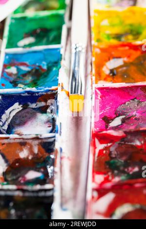 a person's creative process of drawing by mixing different colors of ...