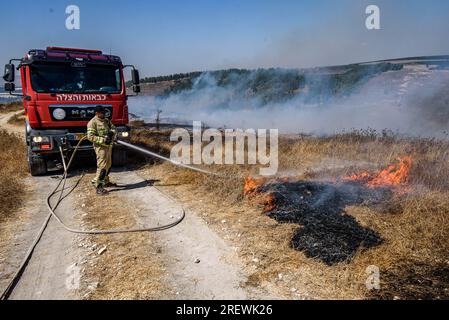 Jish, Israel. 29th July 2023. A firefighting plane flies to extinguish ...
