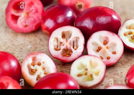 red cut sour useful cranberries, red ripe divided cranberries on the ...