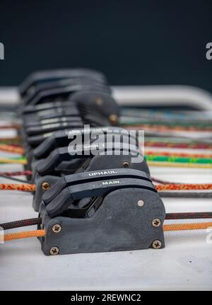 multi-coloured sailing ropes running through rope clutches. rope ...