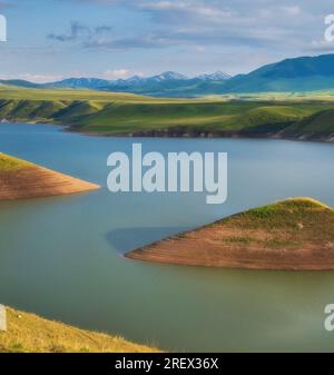 Island in the Bestyubinsk reservoir or Bestobe, reservoir on the Charyn ...