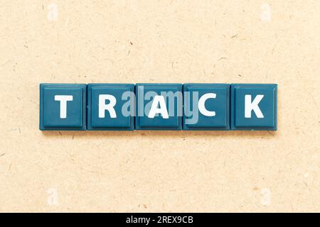 Tile alphabet letter with word freight in red color rack on wood ...