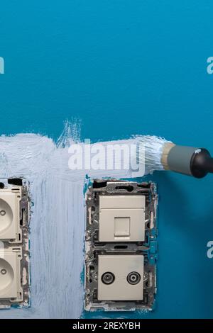 Wall painting around electrical outlets. removed power socket frame for ...