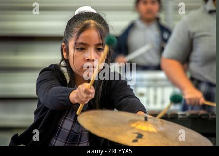 A uniformed student at a Catholic middle school in Santa Ana, CA ...