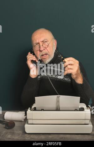 Vintage autor Journalist at work. Desk with telephone and typewriter ...