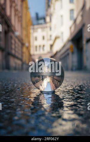 Crystal ball on asphalt road at night. Wide-angle lens Stock Photo - Alamy