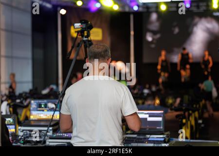 Lighting and Sound Technician and Broadcast Operator at Work in the ...