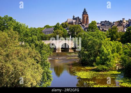 The river Lahn with the old Lahn bridge and the cathedral, Wetzlar ...