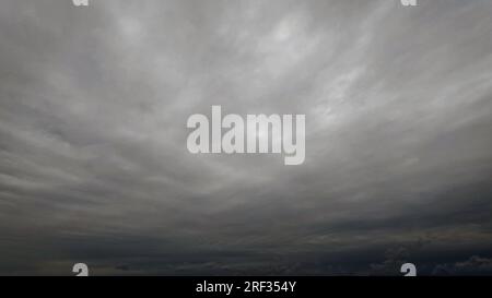 cute cloudscape of sky with massive rain or snow clouds background ...