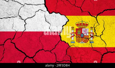 Flags of Spain and Poland on cracked surface - politics, relationship ...