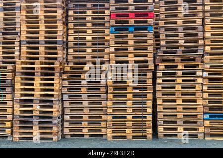 stacks of wooden EPAL pallets on dockyard at Sisimiut, Greenland on a ...