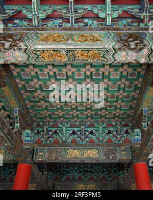 colorful decorated chinese ceiling in a traditional building of the ...