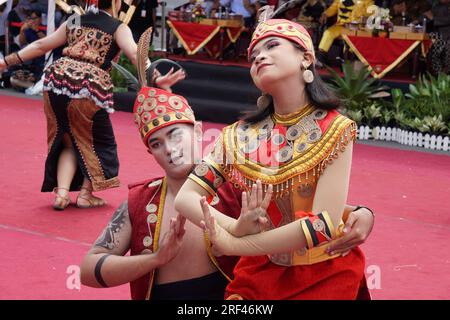 Ruai dance from West Kalimantan at BEN Carnival. This dance tells about ...