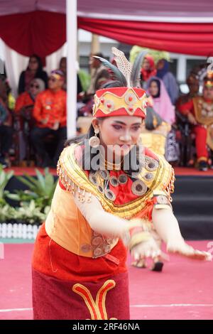 Ruai dance from West Kalimantan at BEN Carnival. This dance tells about ...