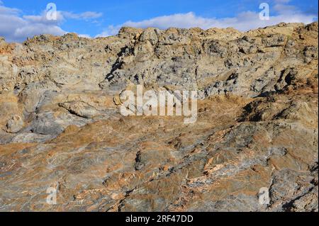 Schist relief. Schist is a metamorphic rock composed mainly for quartz ...
