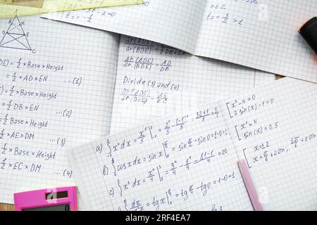 Open copybooks with math formulas as background, closeup Stock Photo ...