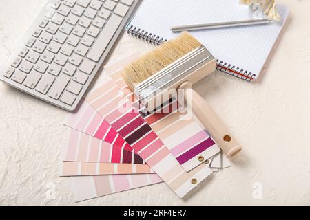 Color palettes, PC keyboard and notebook on light background Stock ...