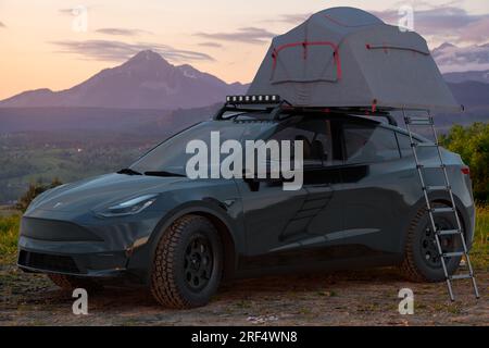 Tesla Model Y tuned for off-road use Stock Photo - Alamy