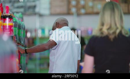 Consumer Behavior Depicted by Diverse Shoppers in Supermarket Aisle ...