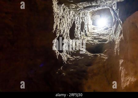 Looking up from the cave to the upper entrance shaft in Derinkuyu ...