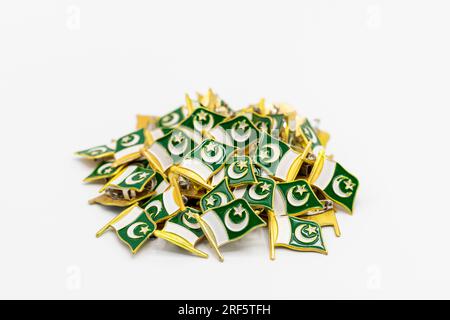 Pile of Pakistan flag badges on white isolated background Stock Photo ...